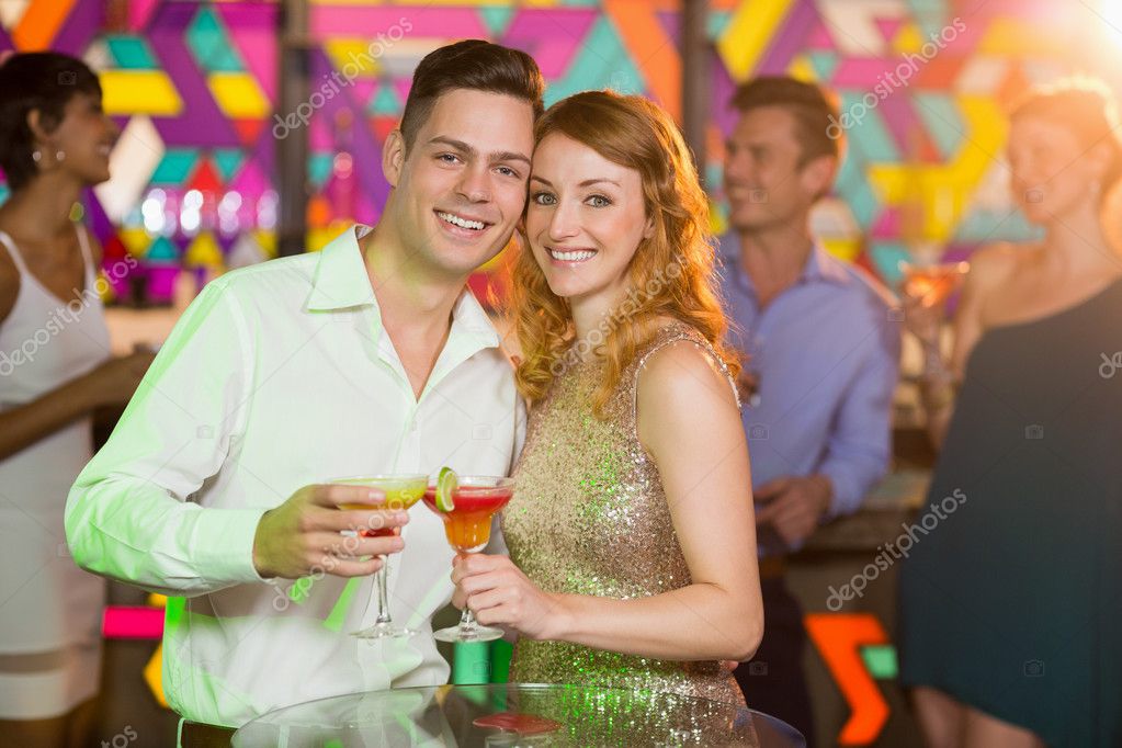 Romantic couple having glass of cocktail — Stock Photo © Wavebreakmedia ...