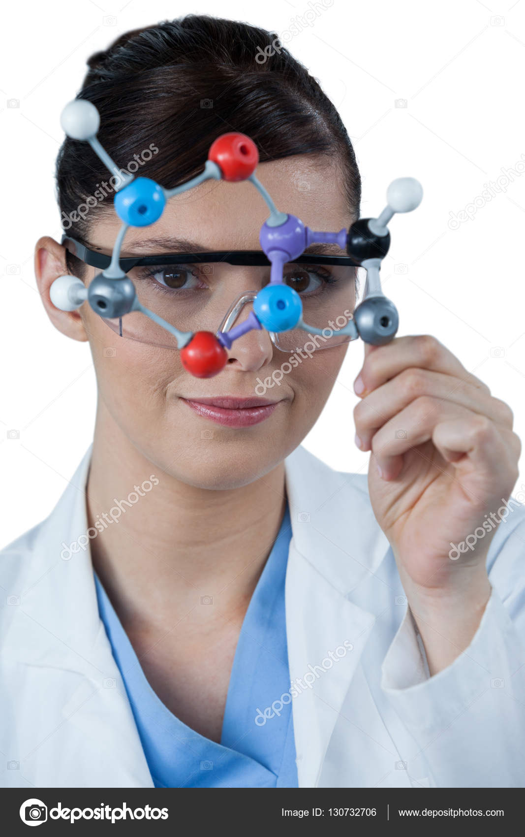 Female scientist holding molecular model Stock Photo by ©Wavebreakmedia ...