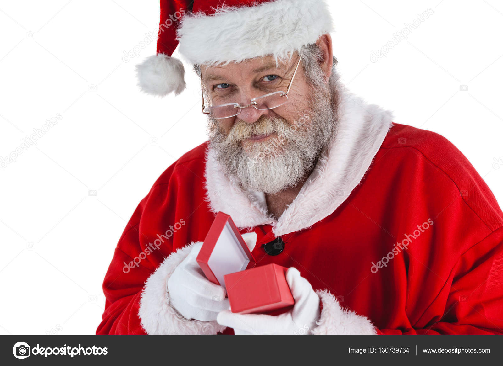 Santa claus opening a gift box — Stock Photo © Wavebreakmedia #130739734