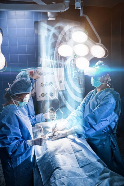 Surgeons performing operation — Stock Photo © Wavebreakmedia #131683790