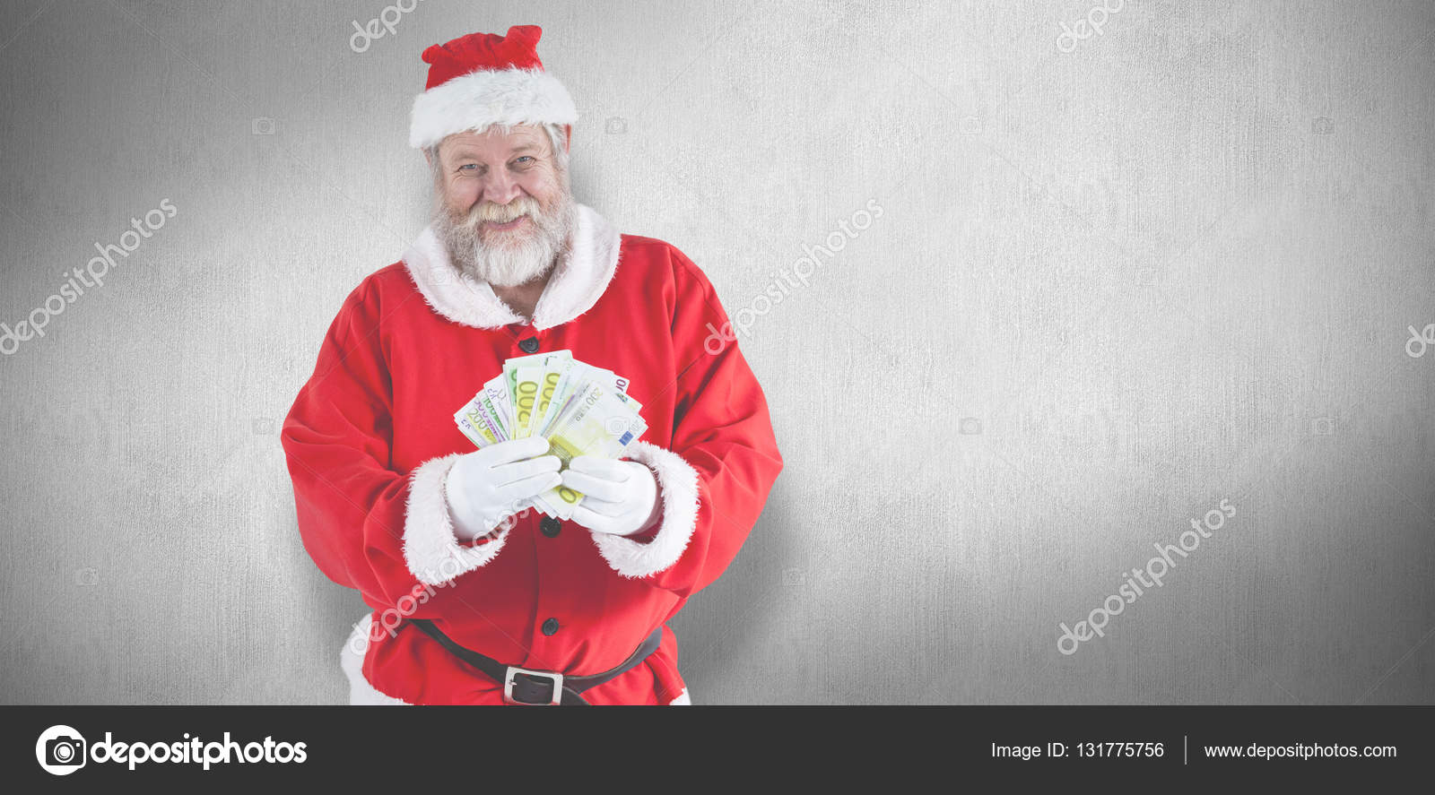 Santa claus showing currency notes Stock Photo by ©Wavebreakmedia 131775756