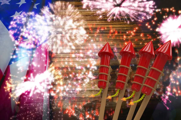 Rocket for fireworks against colourful fireworks Stock Photo by ...