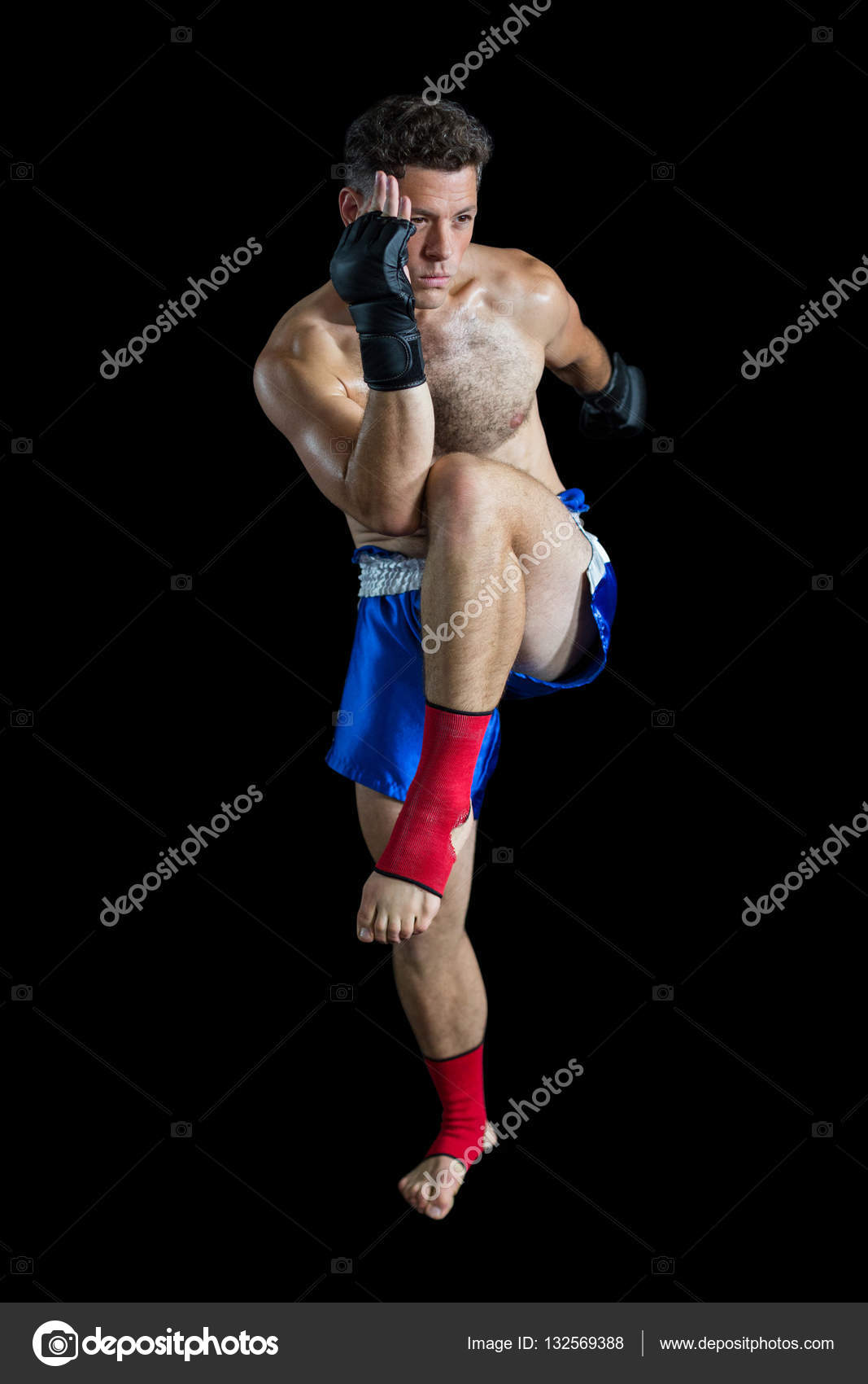 Boxer performing boxing stance Stock Photo by ©Wavebreakmedia 132569388