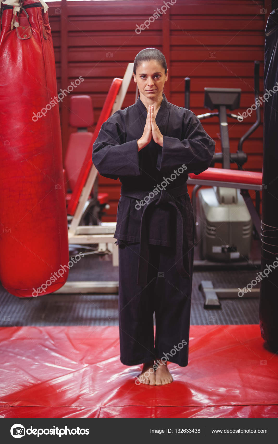 Female karate player performing karate stance — Stock Photo ...