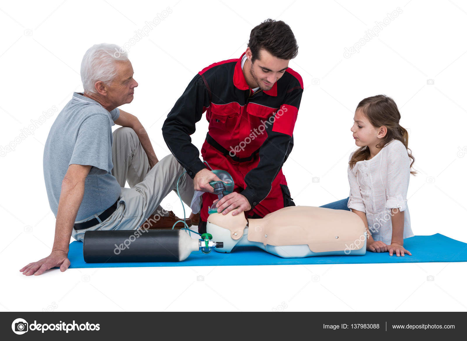 Paramedic training cardiopulmonary resuscitation to man and girl — Stock Photo © Wavebreakmedia ...