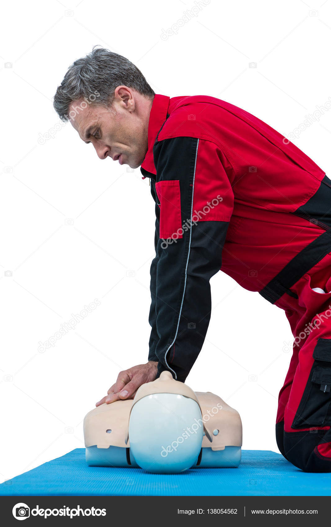 Paramedic practicing resuscitation on dummy Stock Photo by ...