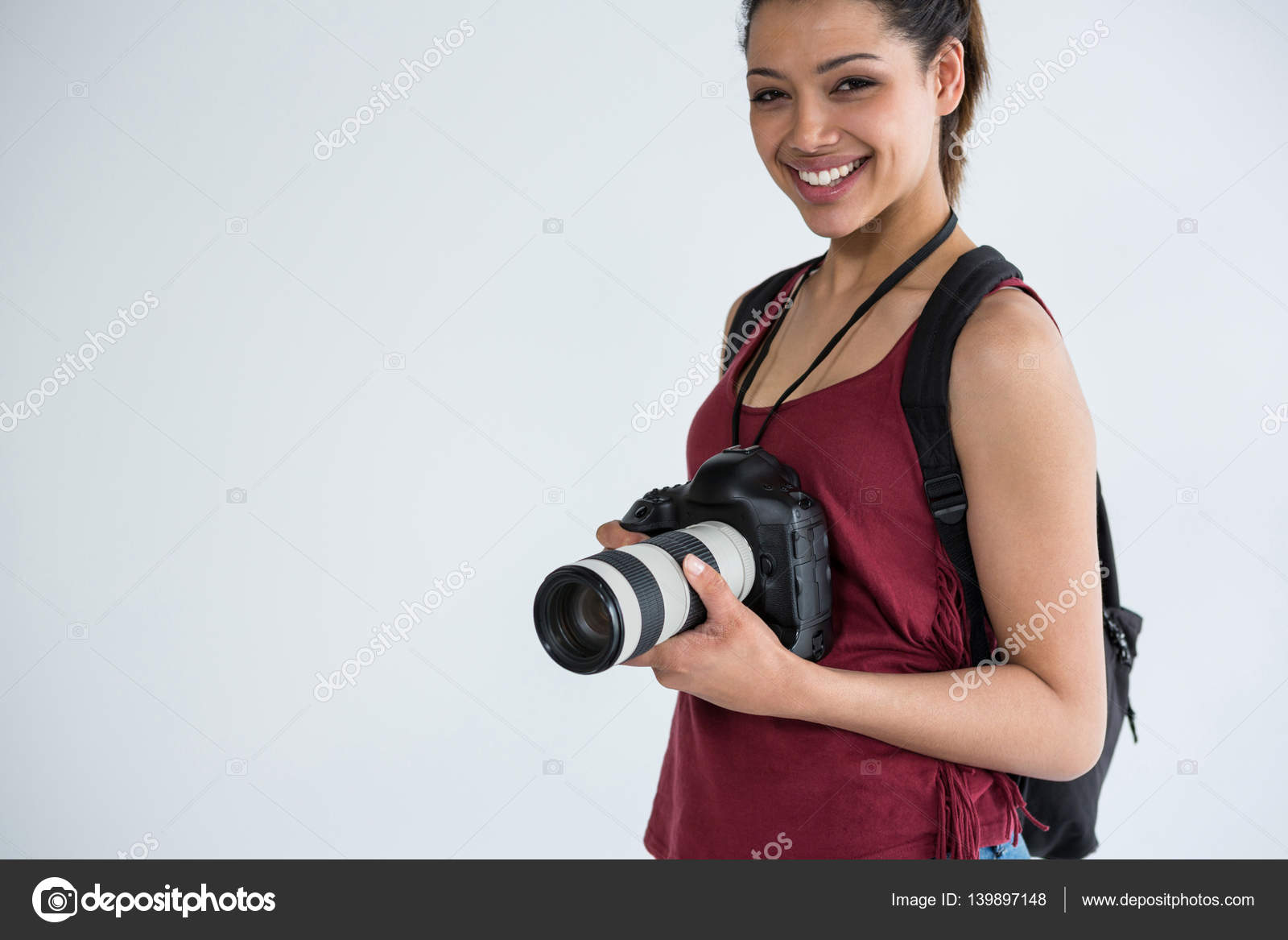 Happy photographer standing in studio Stock Photo by ©Wavebreakmedia ...