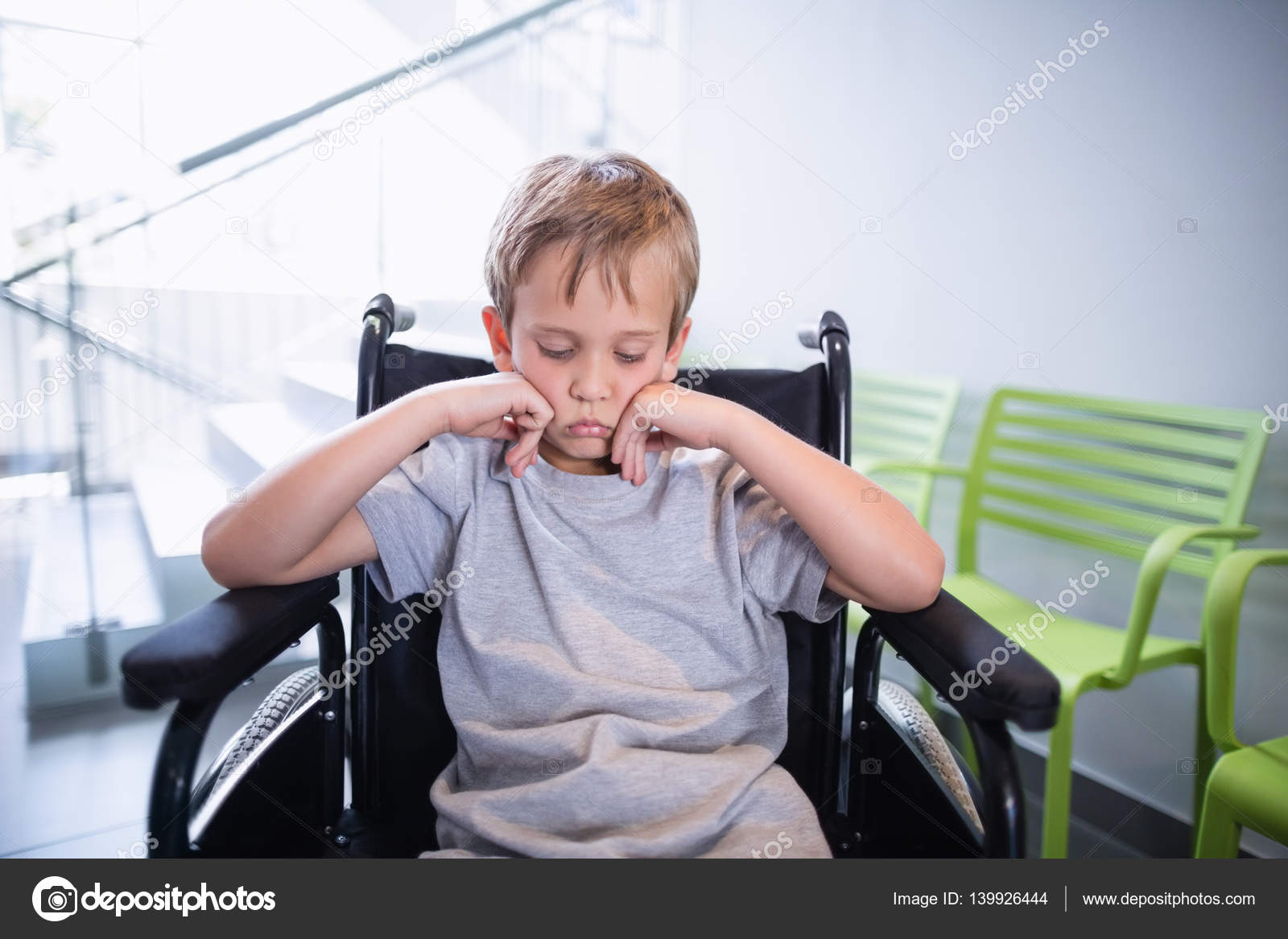 Sad Child In Wheelchair