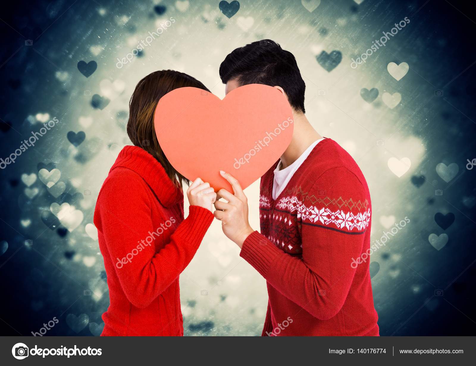 Romantic couple holding heart shape Stock Photo by ©Wavebreakmedia ...