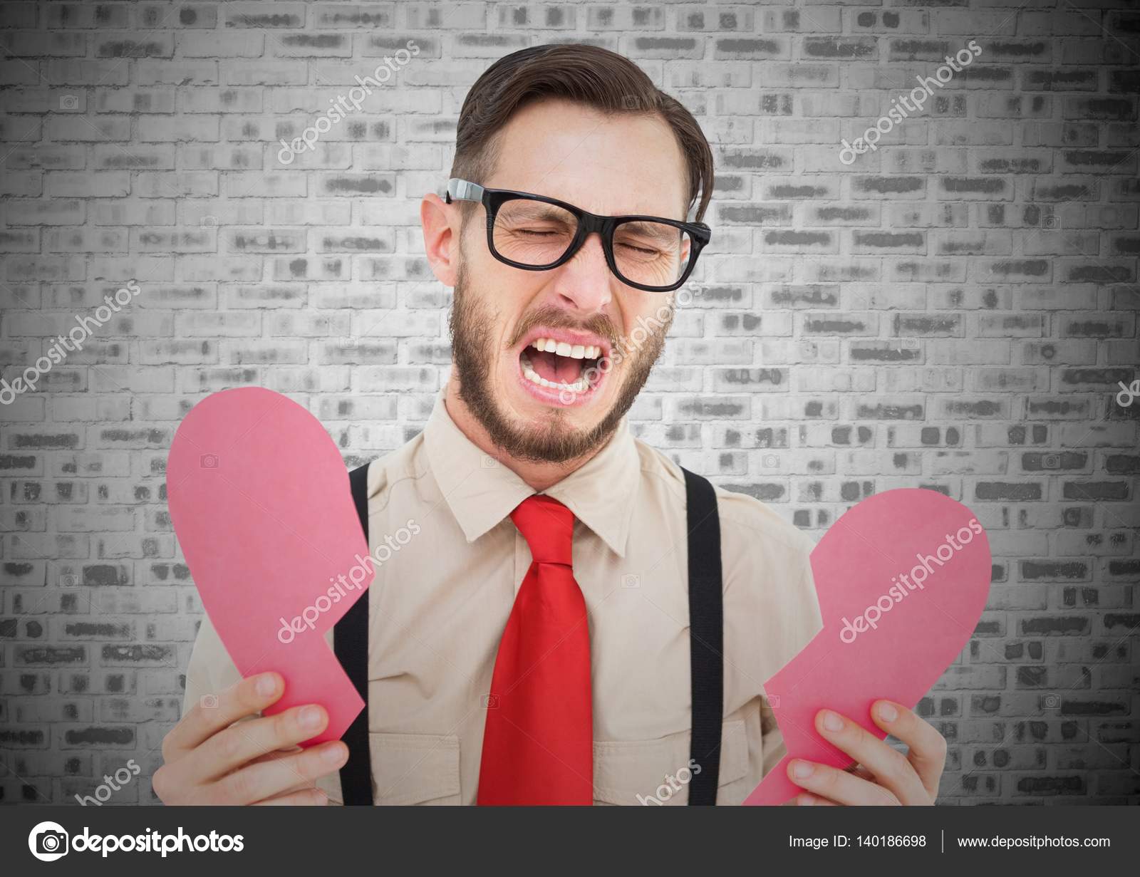 Crying man holding broken heart — Stock Photo © Wavebreakmedia #140186698