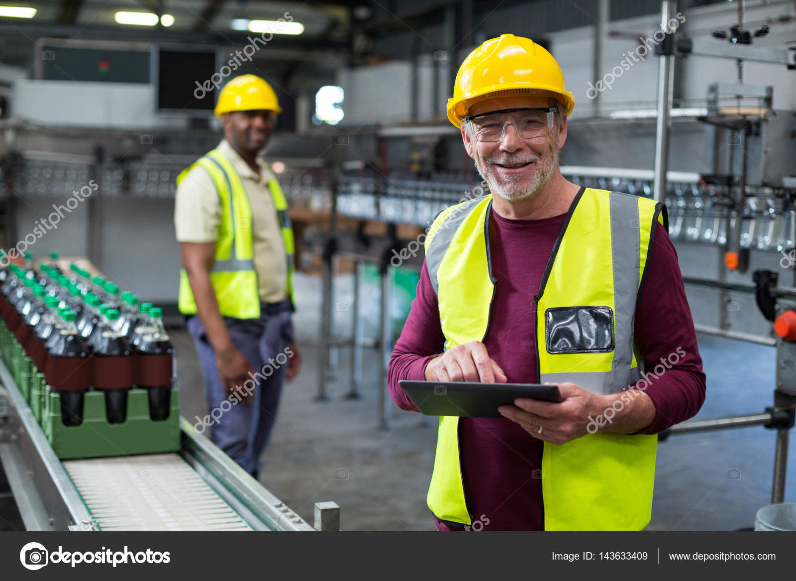 Factory worker with digital tablet — Stock Photo © Wavebreakmedia ...