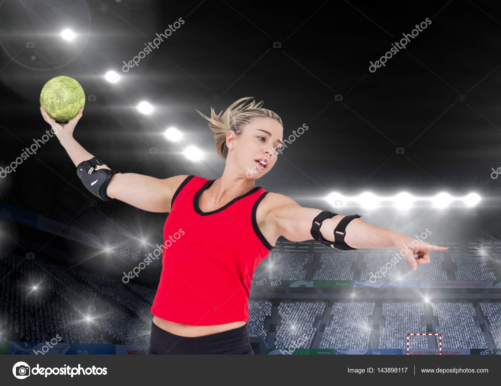 Athlete playing handball against stadium in background — Stock Photo ...