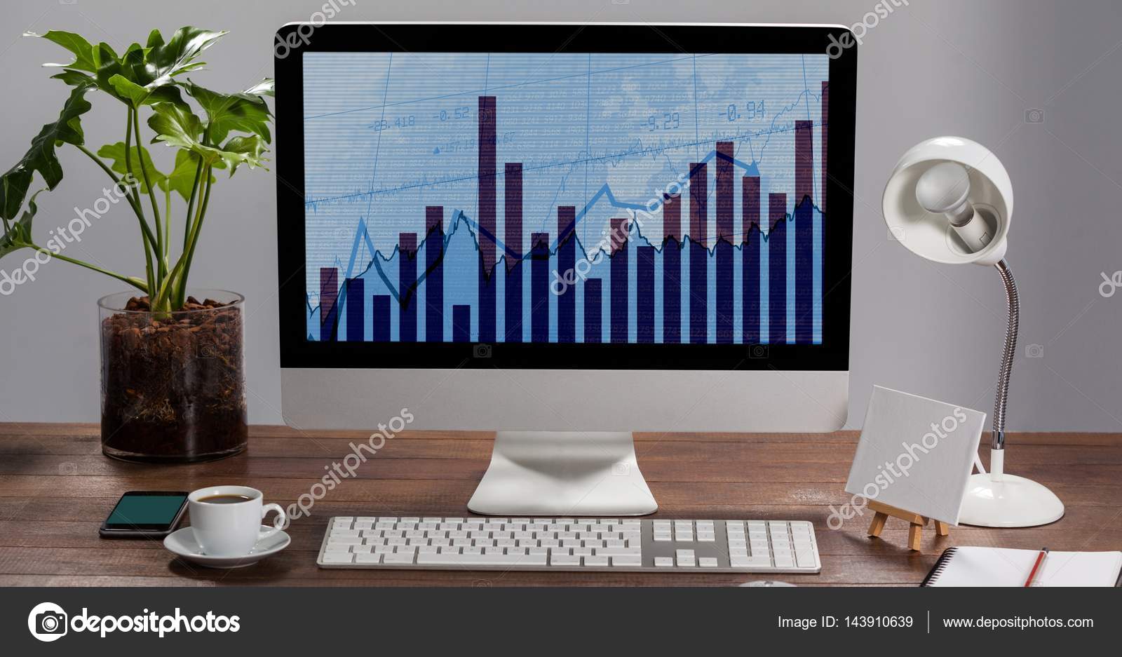 Laptop with graph screen kept on table — Stock Photo © Wavebreakmedia ...