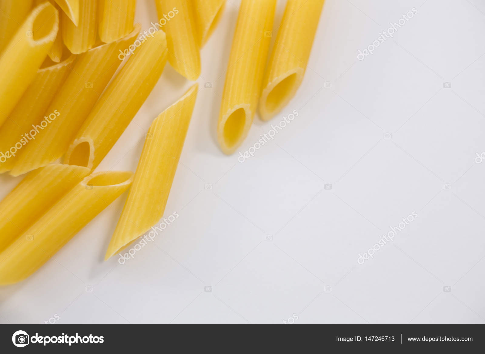 Yellow pennette on white background Stock Photo by ©Wavebreakmedia ...
