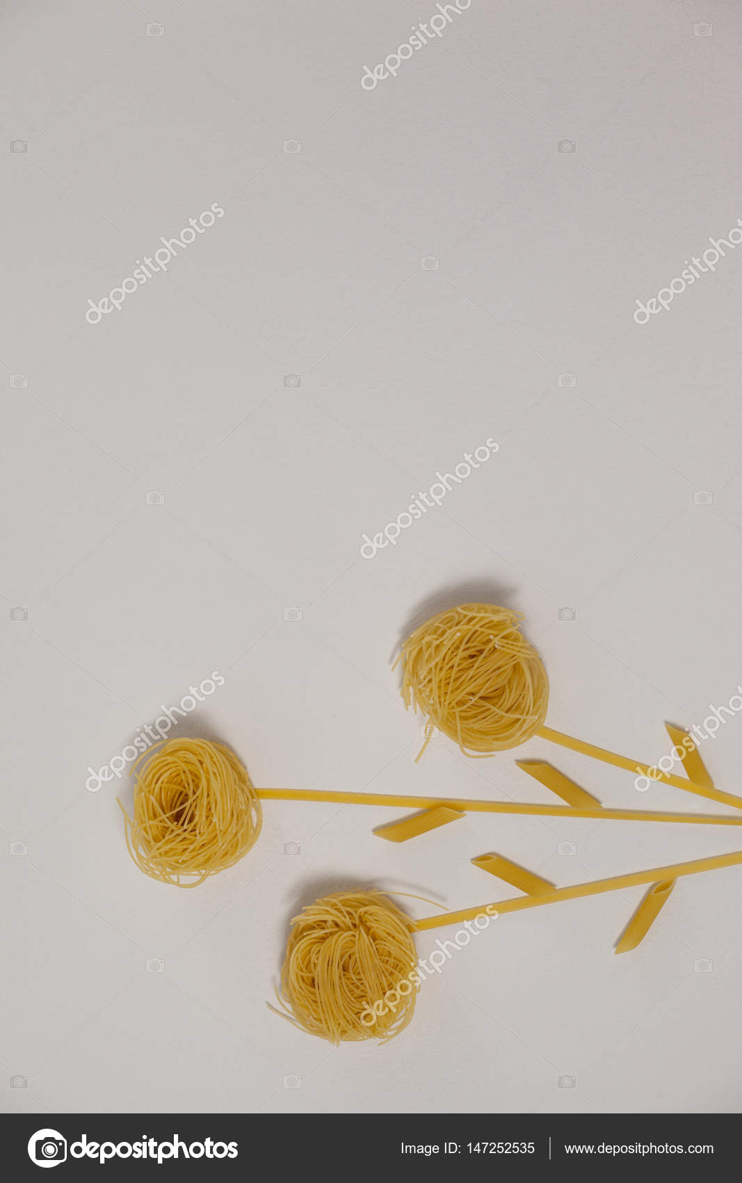 Varieties of pasta making flowers Stock Photo by ©Wavebreakmedia 147252535