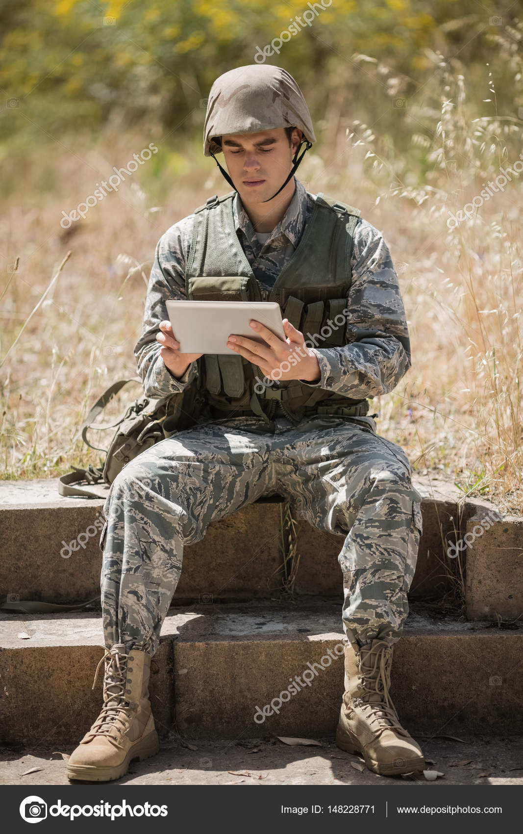 Military soldier using digital tablet Stock Photo by ©Wavebreakmedia ...
