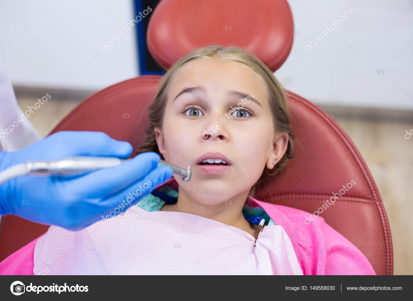 Patient scared during a dental check-up Stock Photo by ©Wavebreakmedia ...