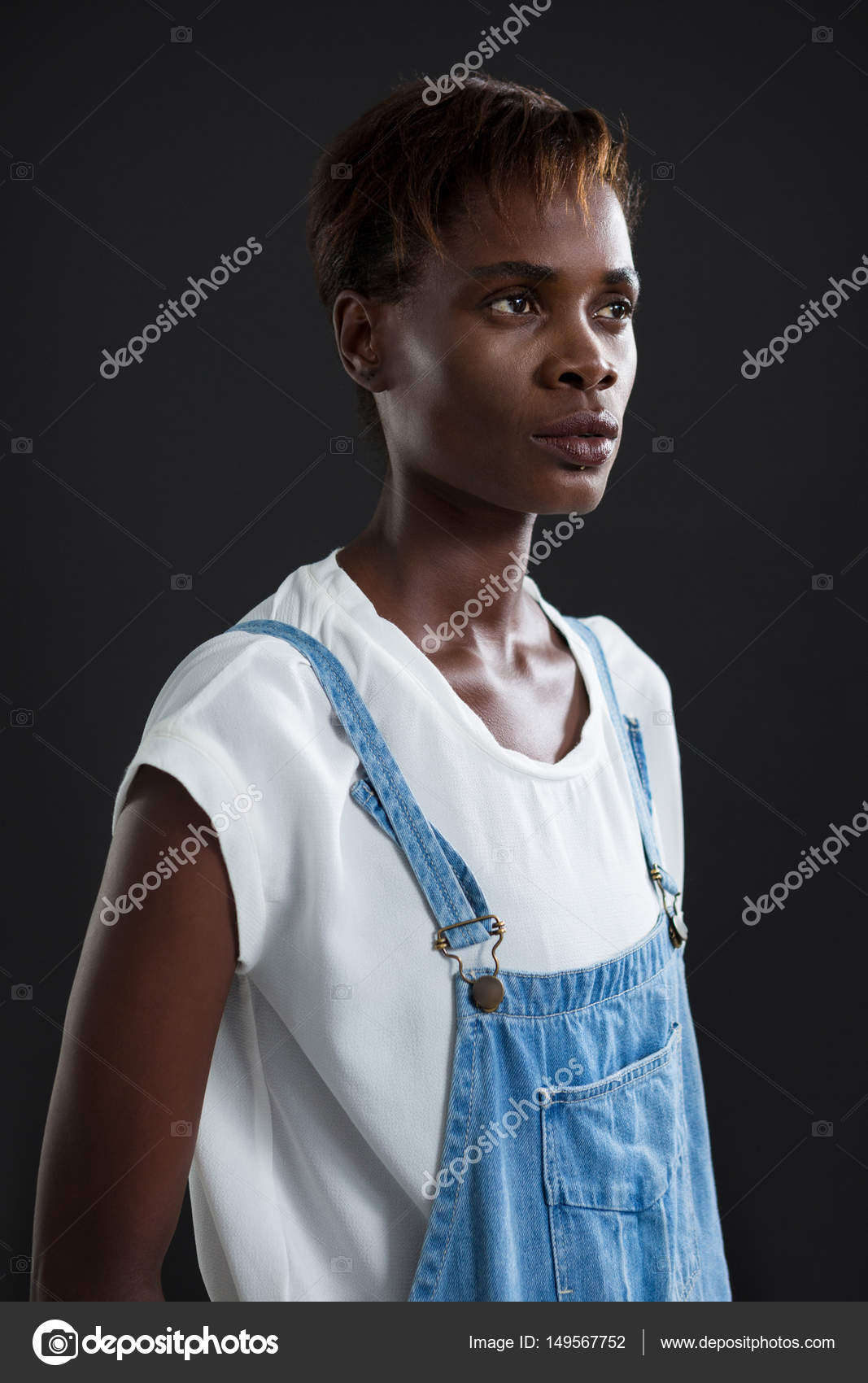 Androgynous man against grey background — Stock Photo © Wavebreakmedia ...
