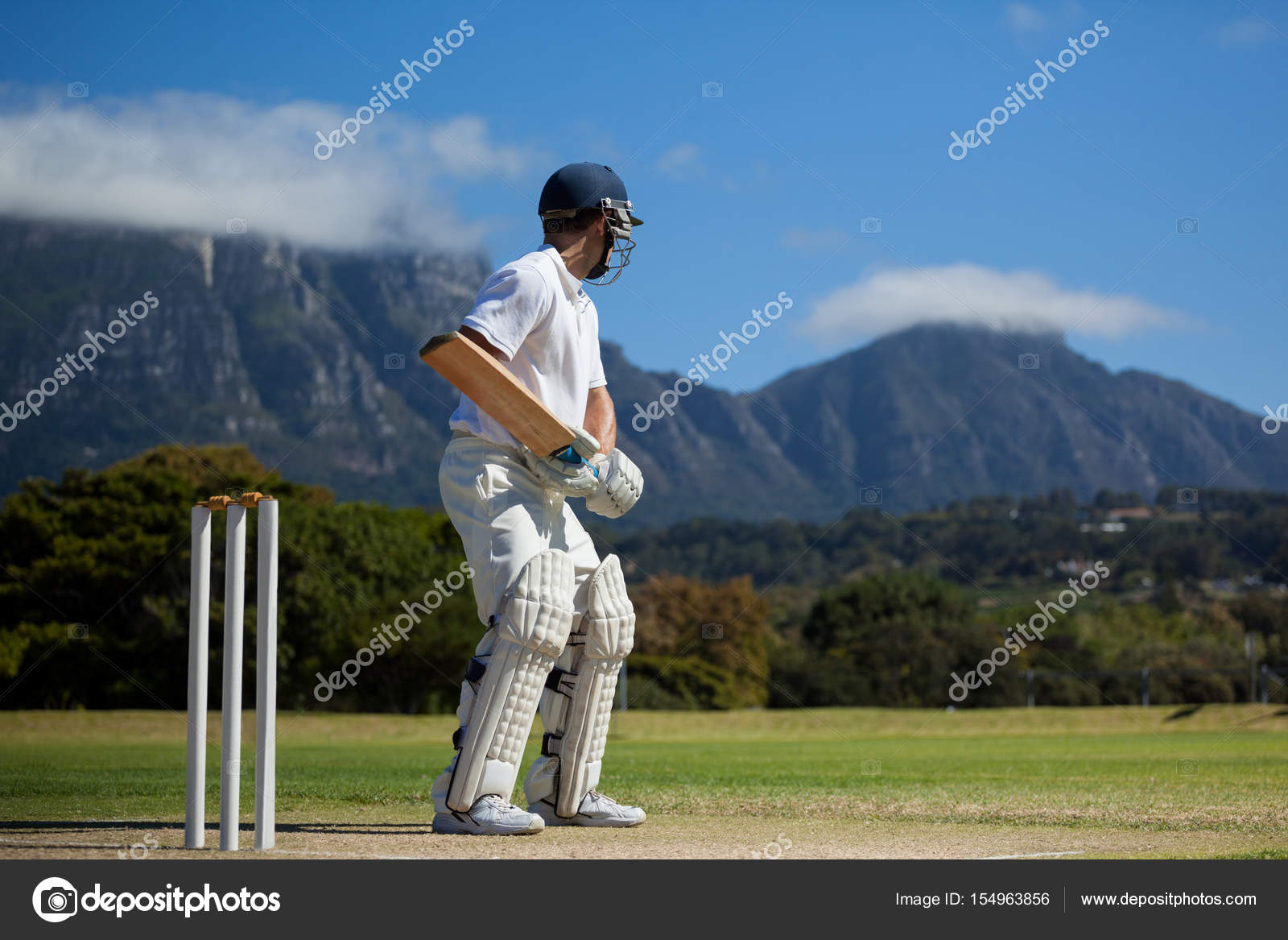 Cricket player practicing on field Stock Photo by ©Wavebreakmedia 154963856