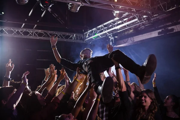 Crowd surfing Stock Photos, Royalty Free Crowd surfing Images ...