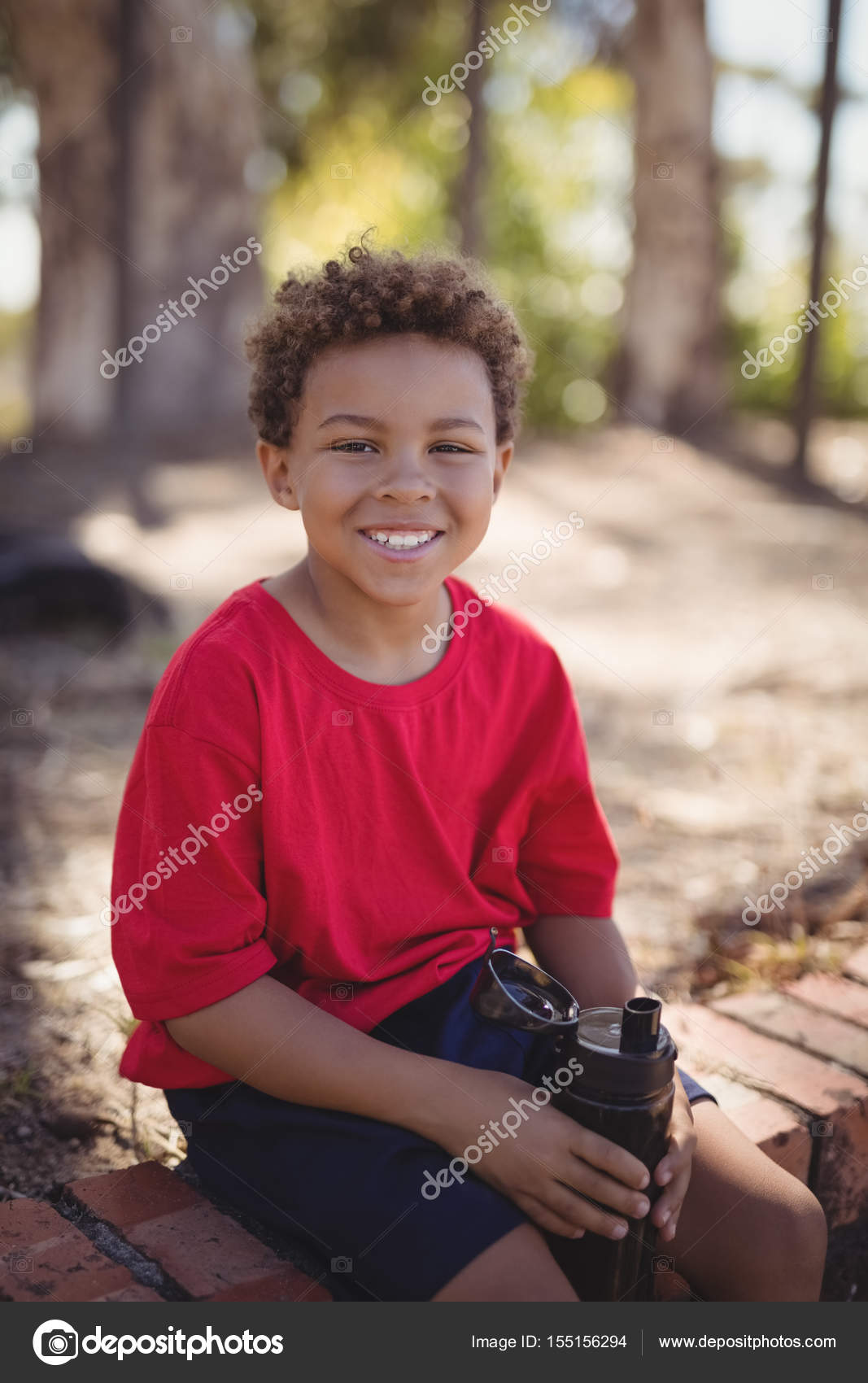 Boy relaxing after workout Stock Photo by ©Wavebreakmedia 155156294