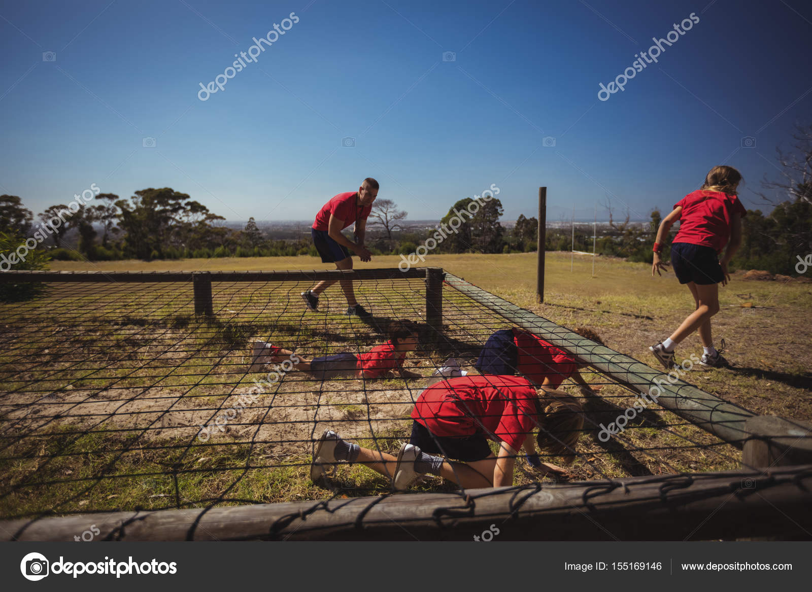 Kids crawling under net Stock Photo by ©Wavebreakmedia 155169146