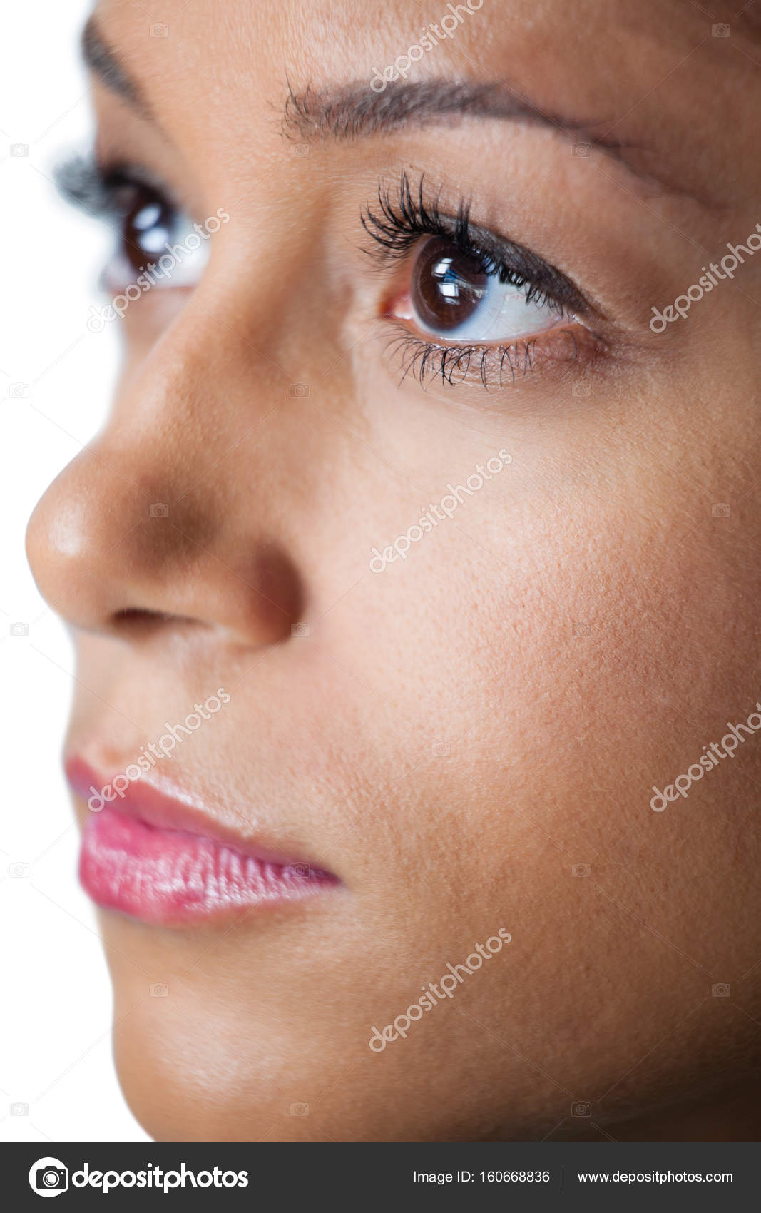 Female face looking sideways Stock Photo by ©Wavebreakmedia 160668836