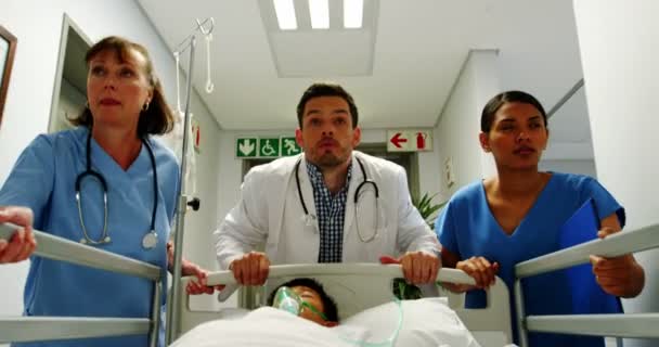 Doctor and nurse with female patient Stock Photo by ©monkeybusiness ...