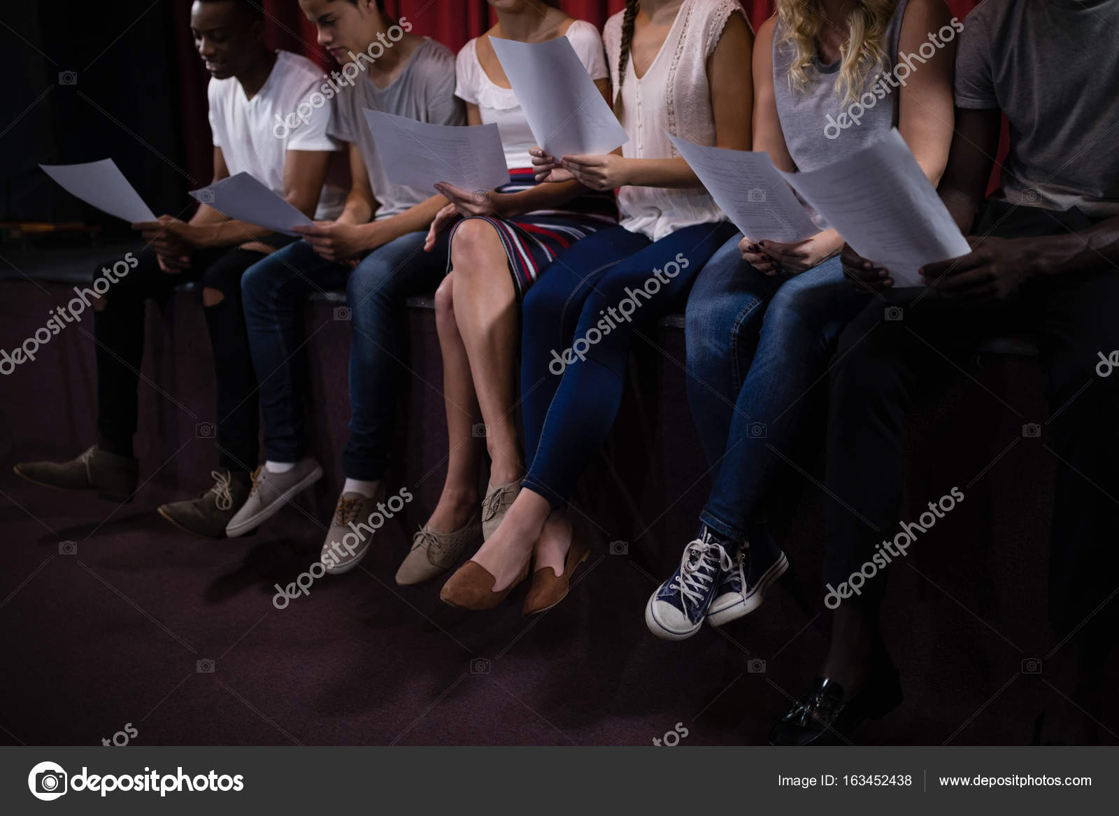 Actors reading their scripts on stage in theatre Stock Photo by ...