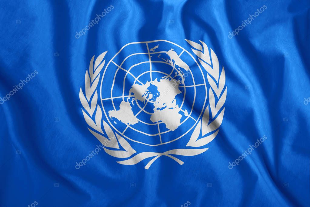 La bandera de la ONU ondea en el viento. Bandera colorida de la ONU ...