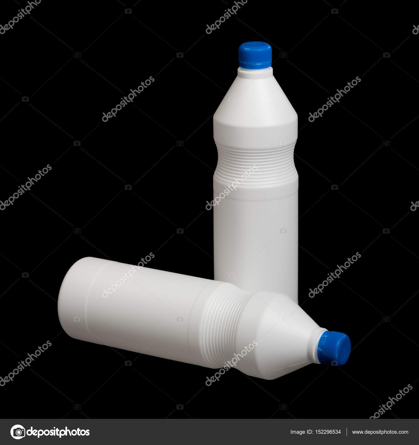Two white plastic bottles — Stock Photo © igorkovalcuk #152296534 Two white plastic bottles — Stock Photo © igorkovalcuk #152296534