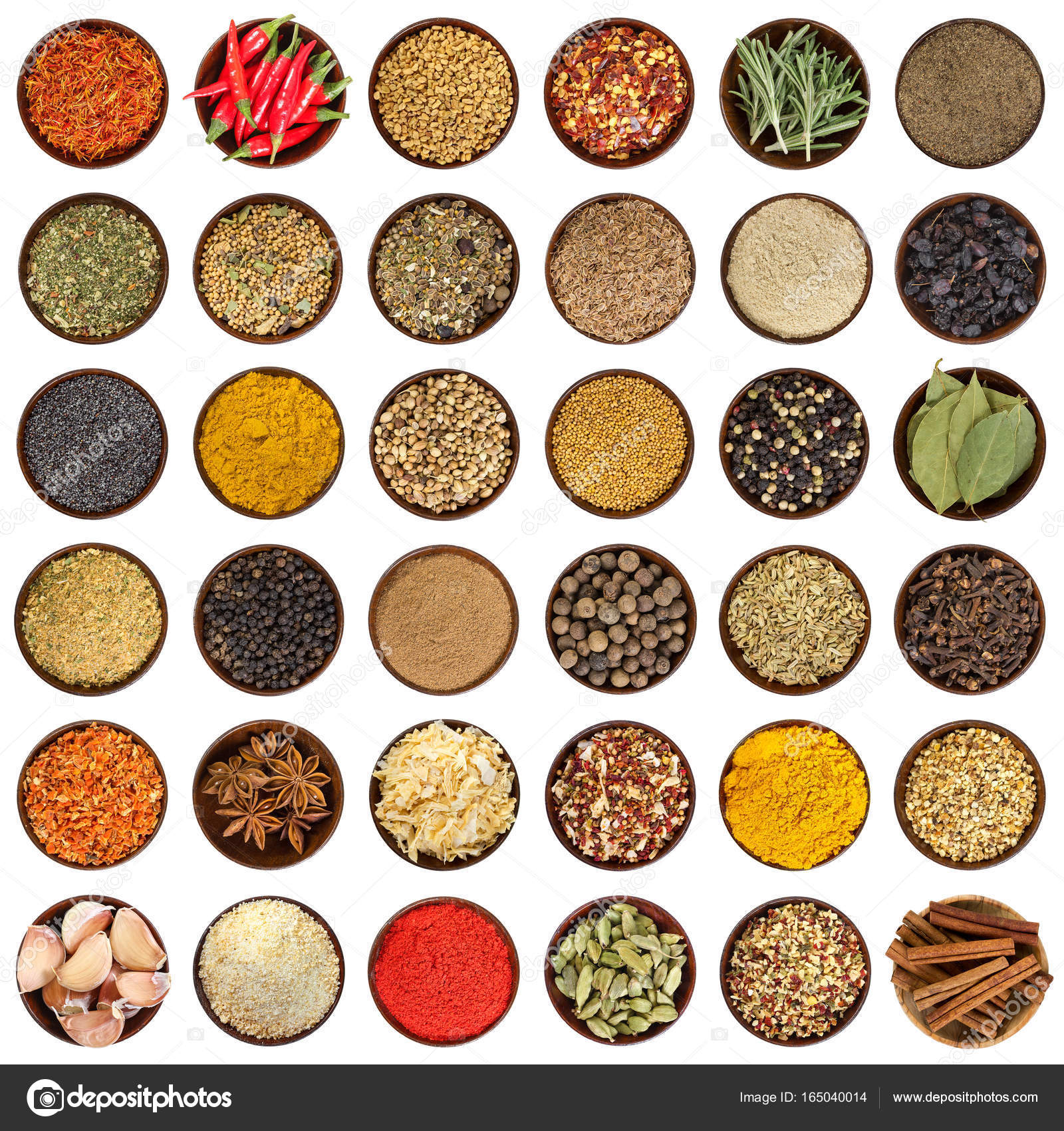 Set of different spices in wooden bowl. Top view. Stock Photo by ...