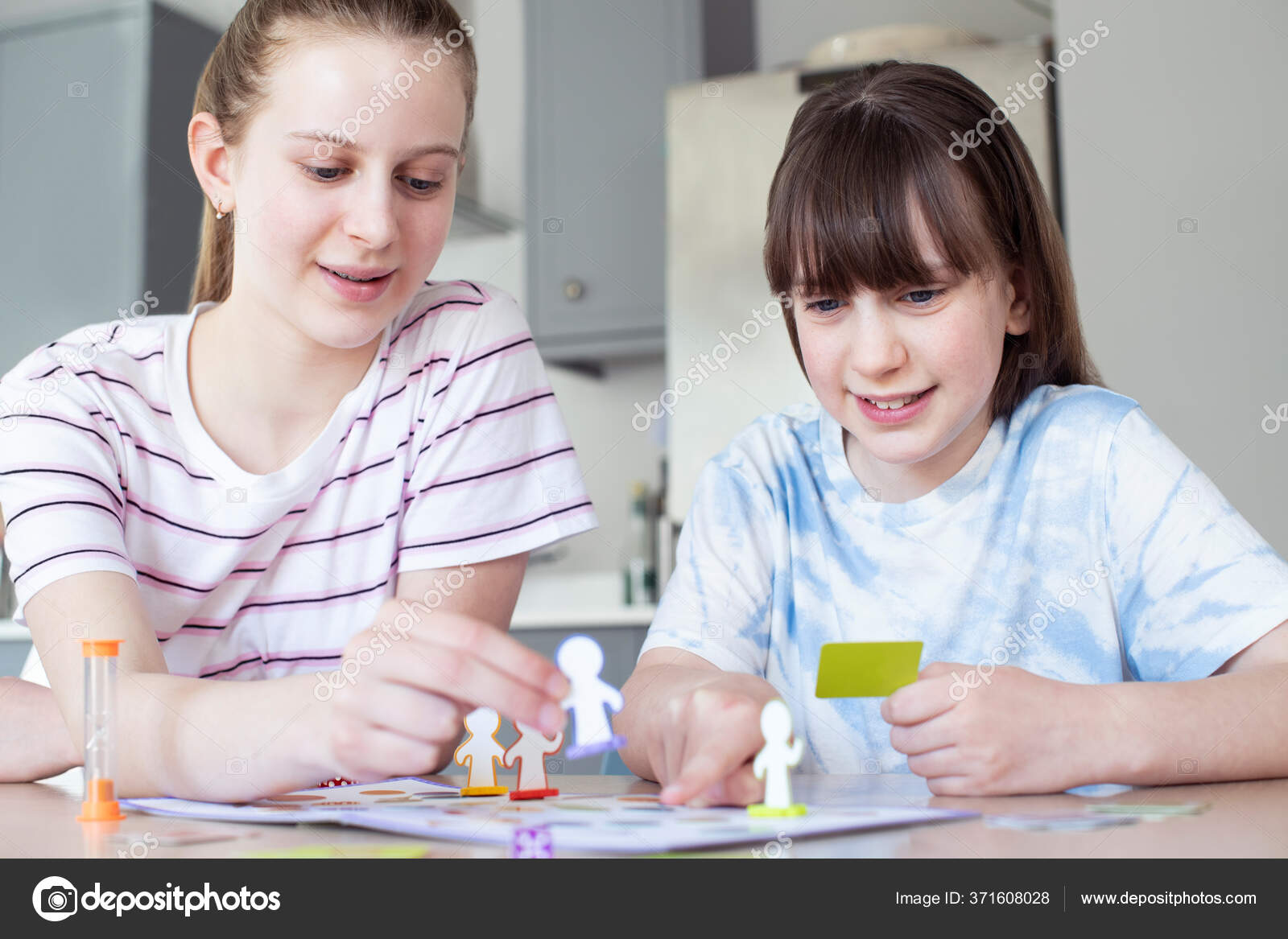 Two Children Playing Generic Board Game Home Together Stock Photo by ...