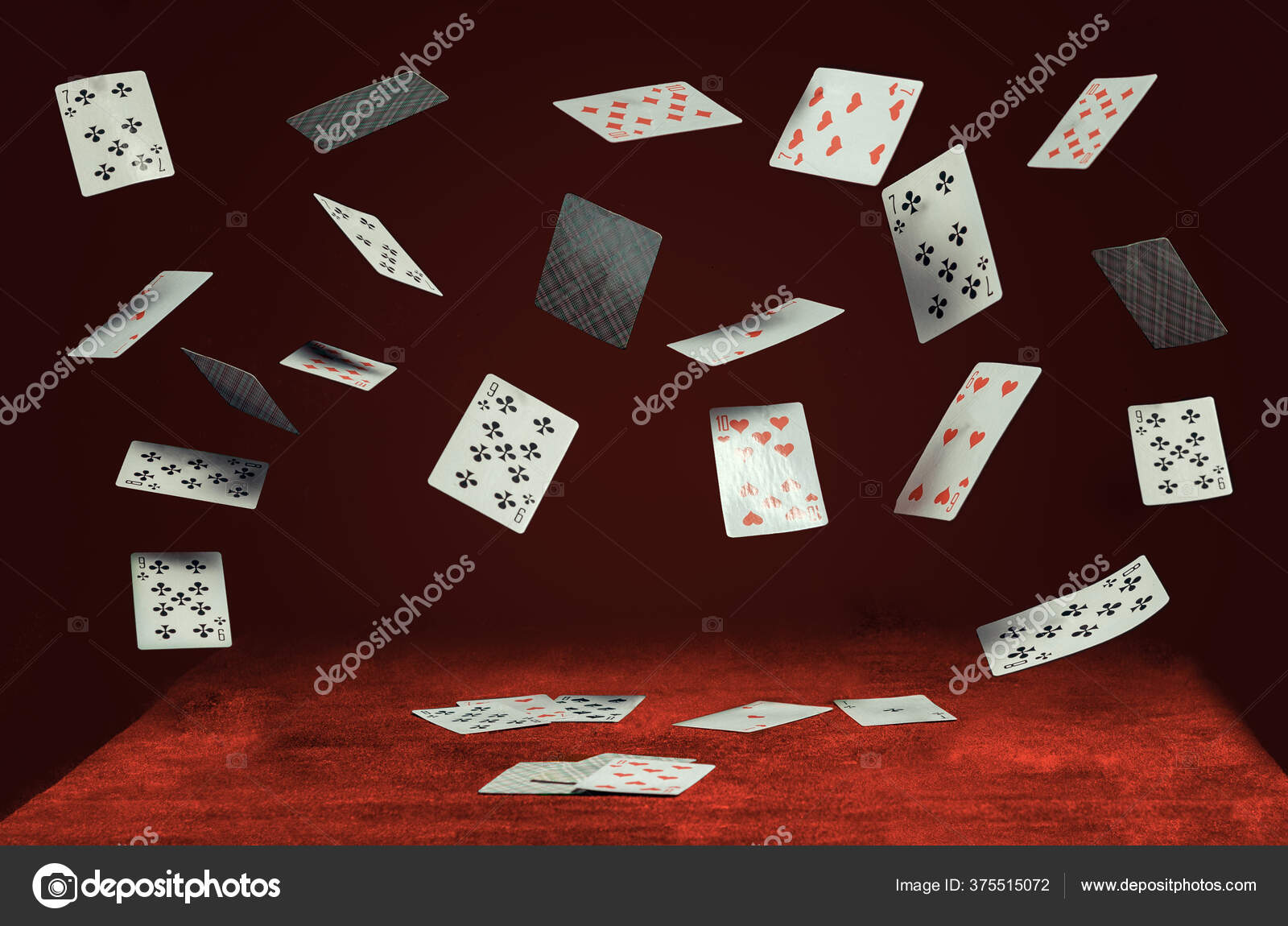 Playing cards fall on a table with red cloth — Stock Photo © Gera8th ...