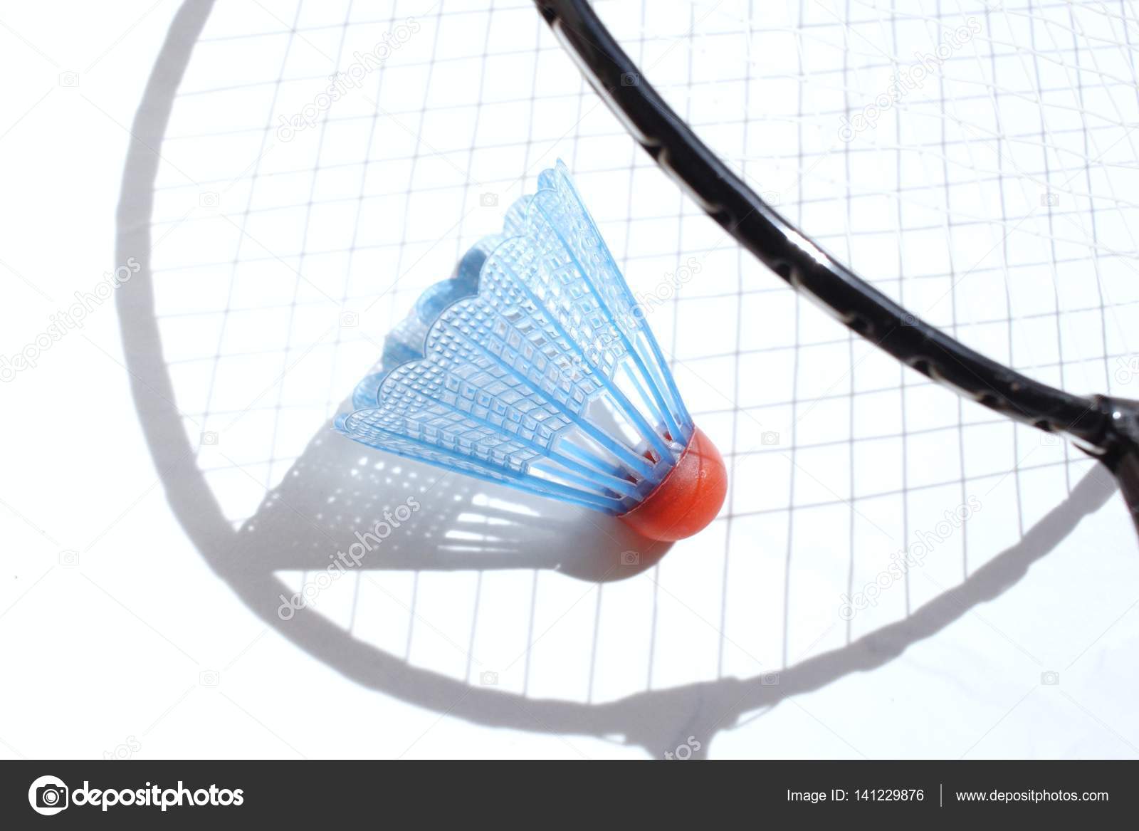Shuttlecocks with badminton racket and shadow Stock Photo by ©luknaja ...