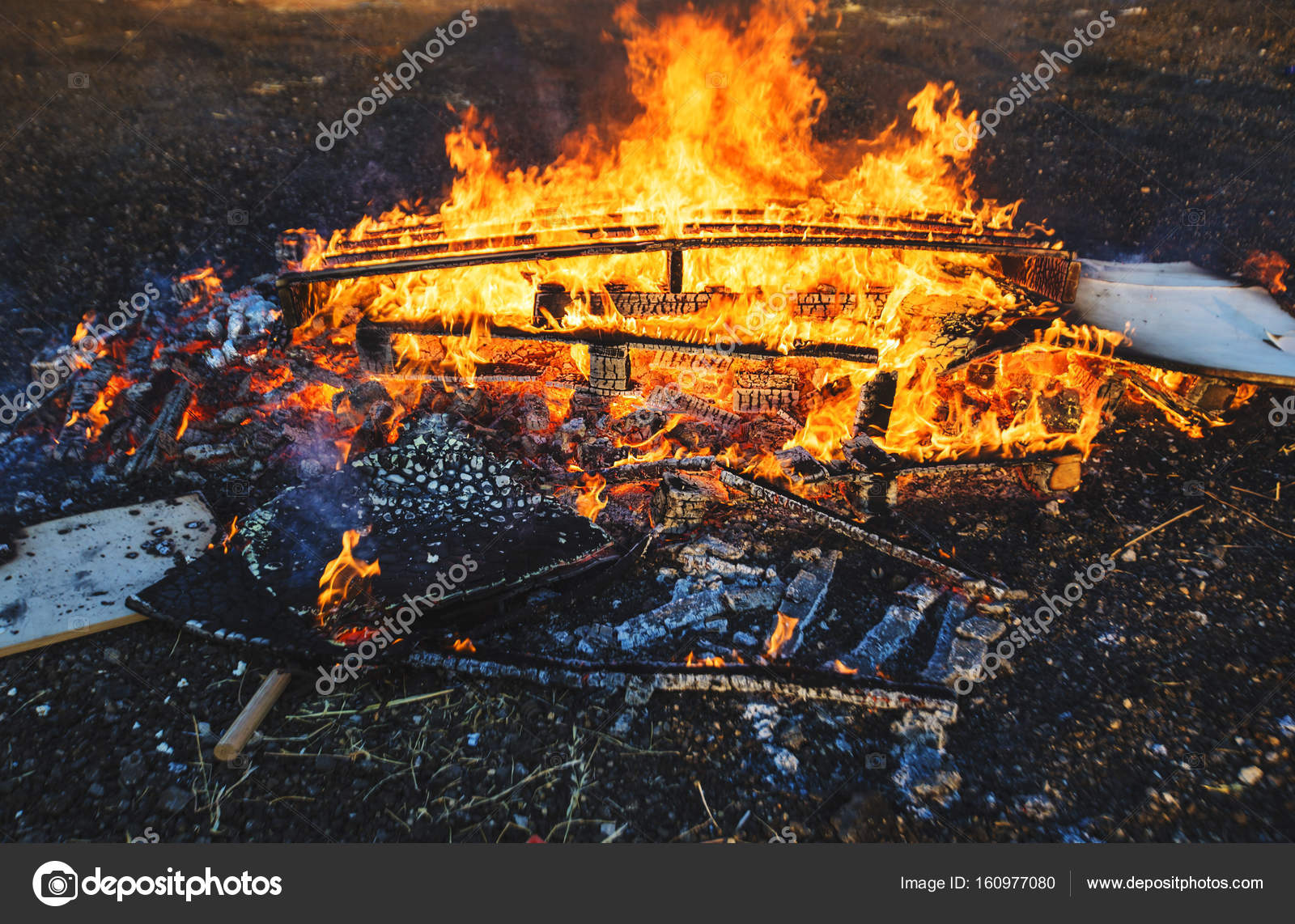 Big orange bonfire with a dark background Stock Photo by ©Viculia 160977080