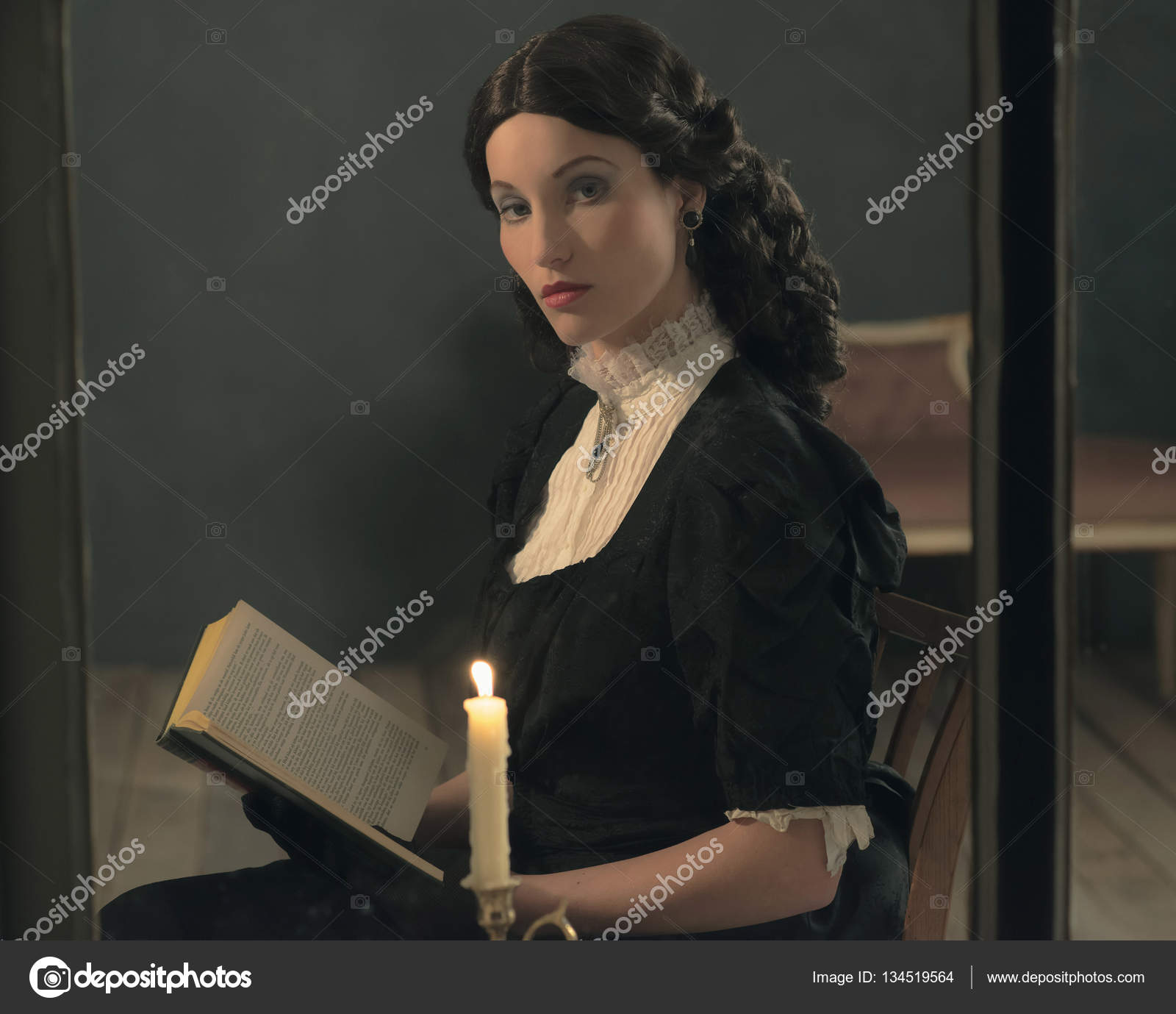 Victorian woman reading book Stock Photo by ©ysbrand 134519564