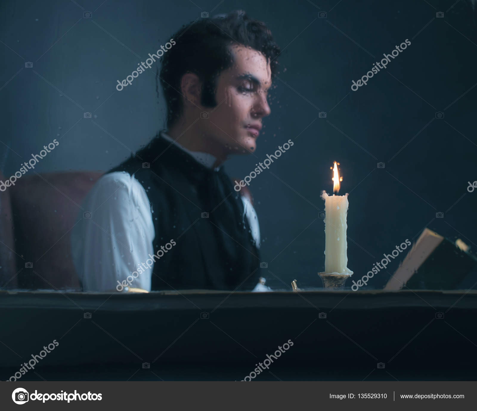 Retro victorian man reading book Stock Photo by ©ysbrand 135529310
