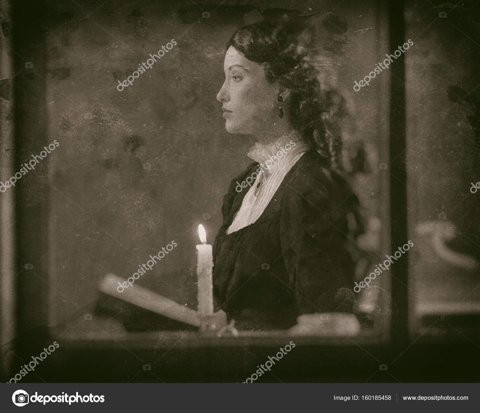 Victorian woman reading book Stock Photo by ©ysbrand 160185458