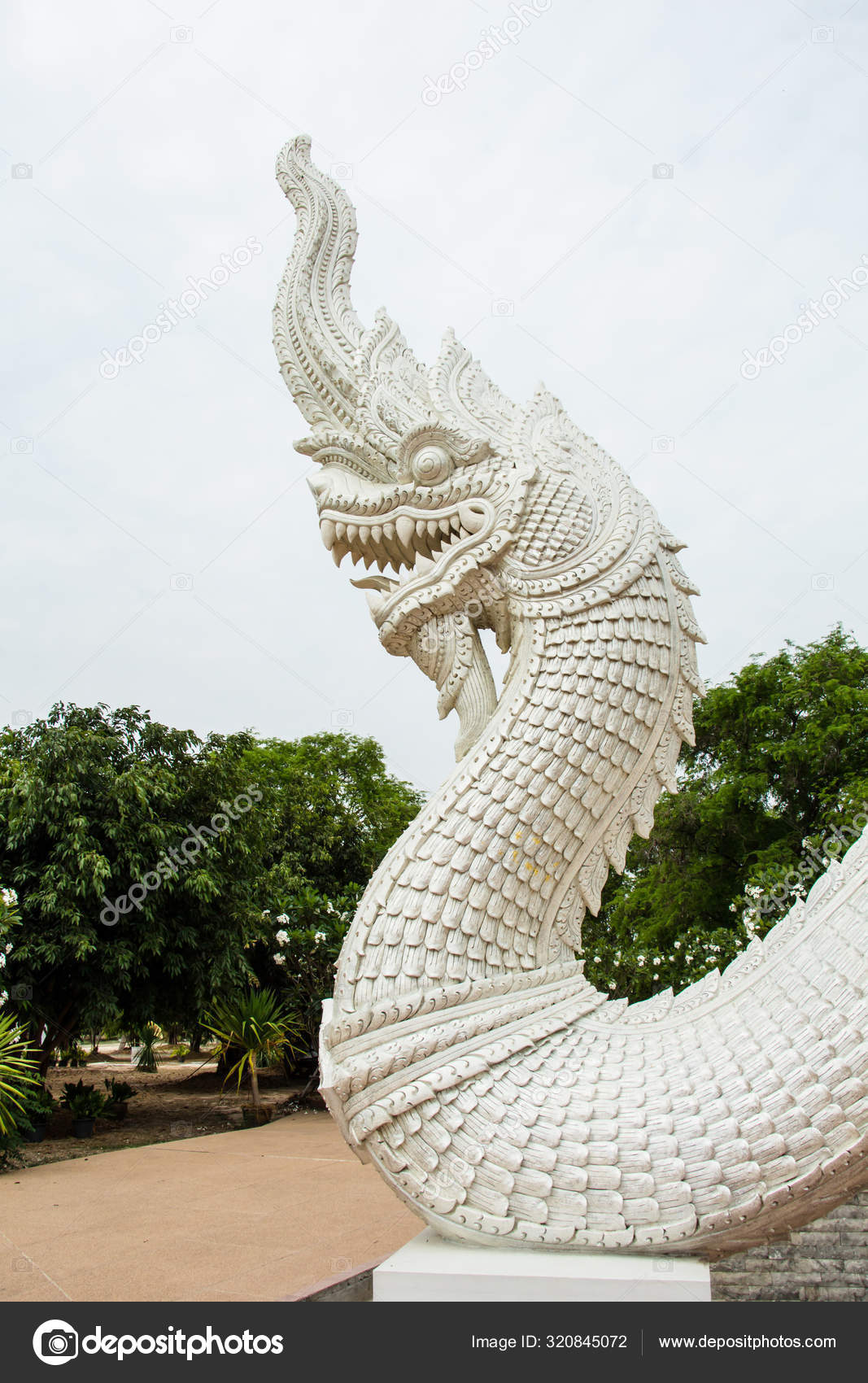 Naga Scale Blue Sky Background Stock Photo by ©jukree 320845072