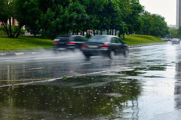 Cars driving in rain Images - Search Images on Everypixel