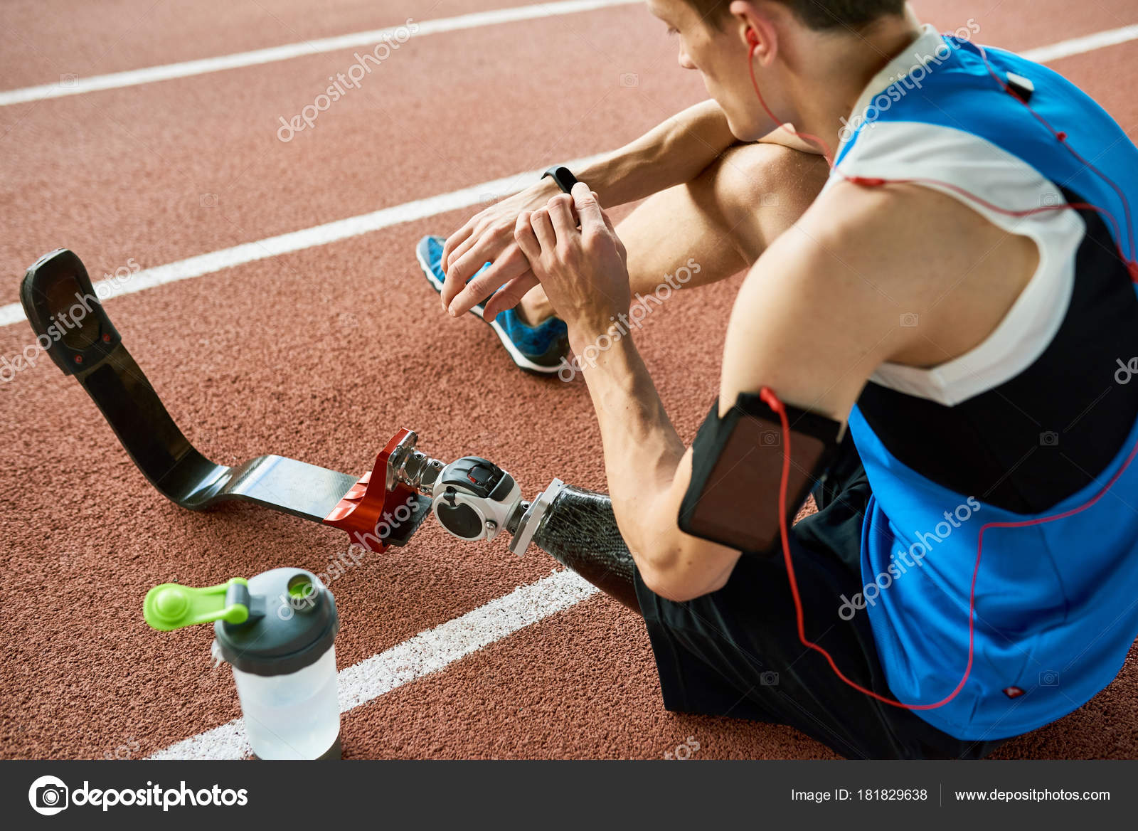 High Angle Portrait Young Amputee Athlete Sitting Running Track Taking ...