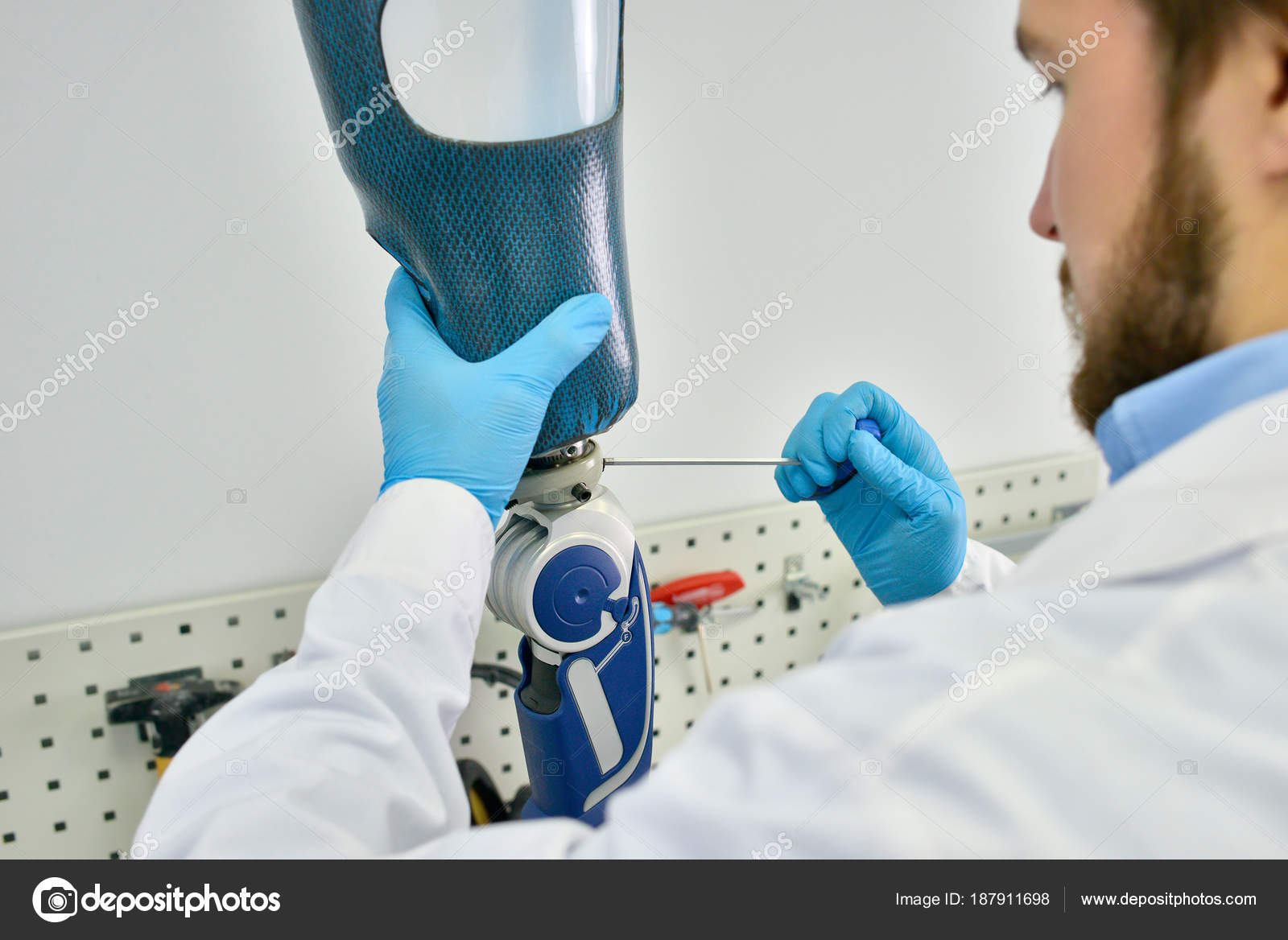 Portrait Prosthetic's Technician Making Leg Prosthesis Sitting Desk ...
