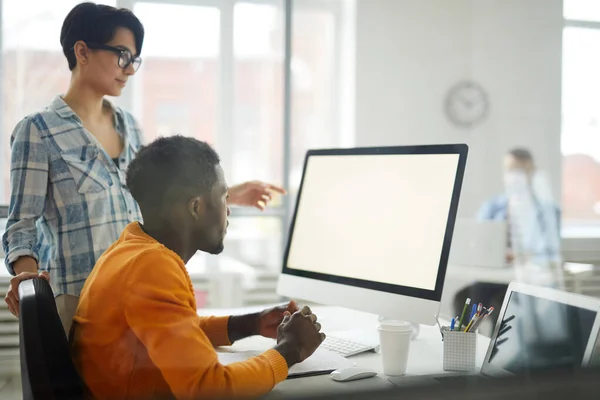 Side view portrait of two modern young people looking at blank white ...
