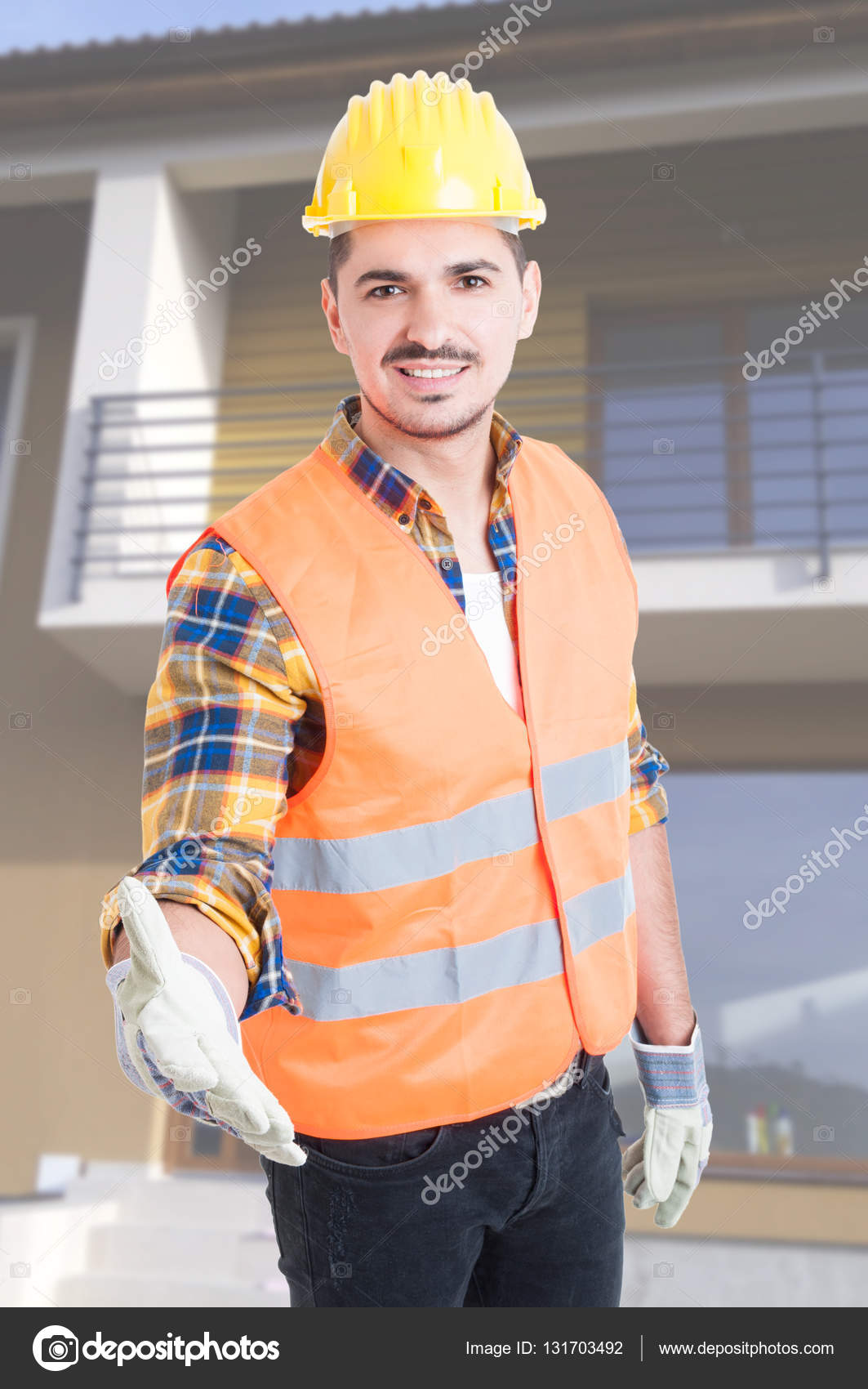 Friendly engineer or architect doing handshake gesture Stock Photo by ...