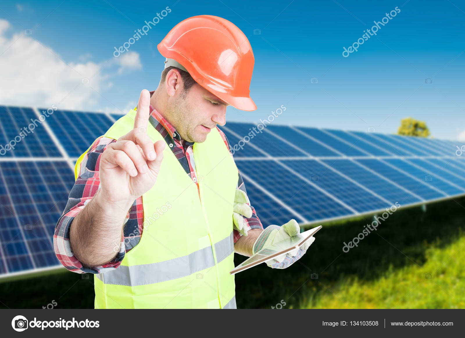 Busy engineer browsing something on tablet Stock Photo by ©catalin205 ...