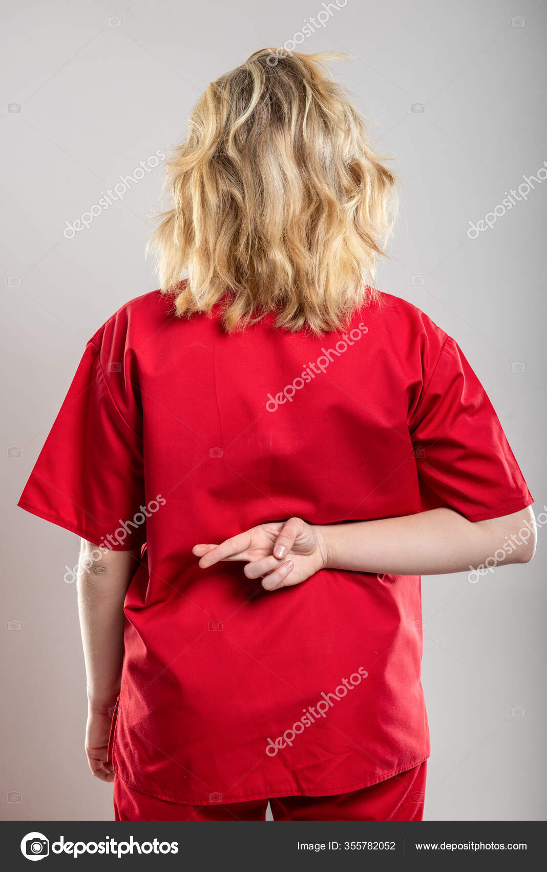 Back View Nurse Wearing Red Scrub Showing Fingers Crossed Gesture ...