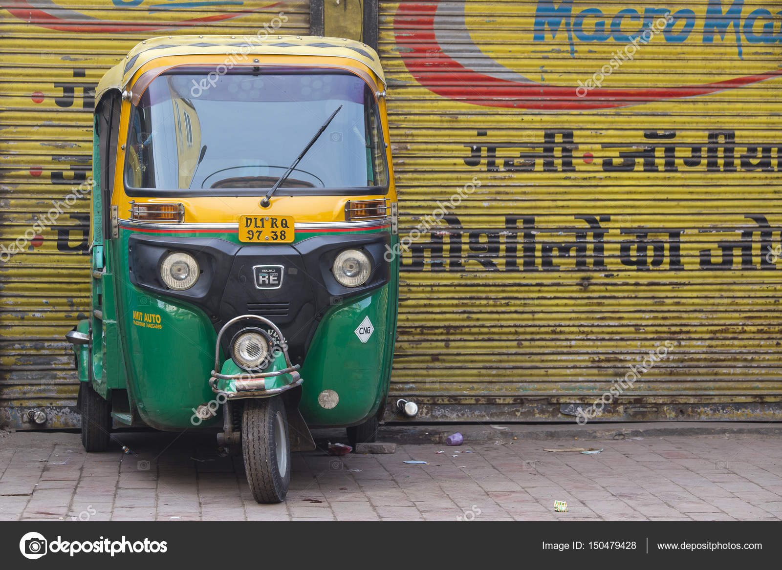 Auto rickshaw taxis on a road in New Delhi, India – Stock Editorial ...