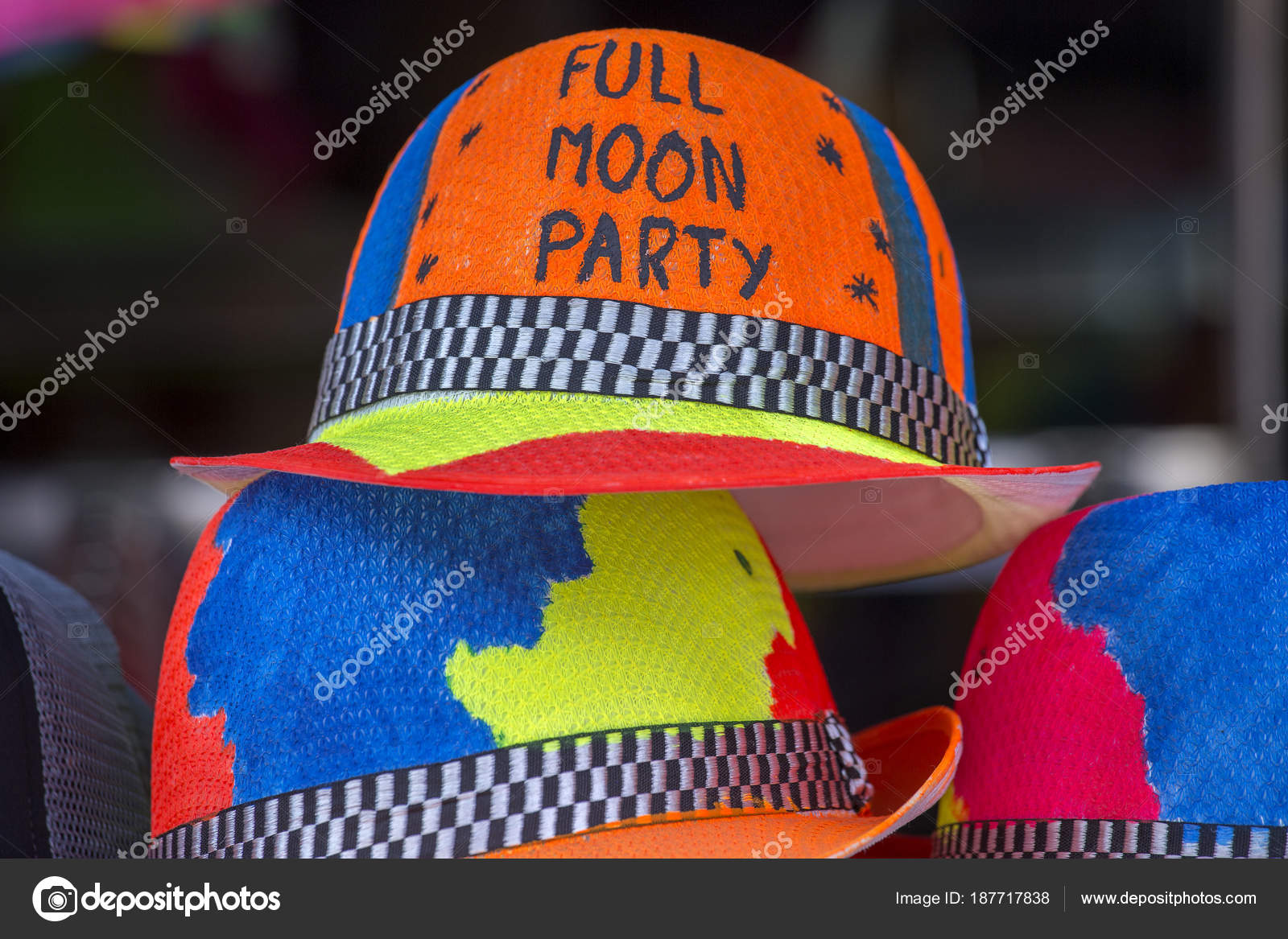 Decorated colorful hats sold on the beach before of the Full moon party ...