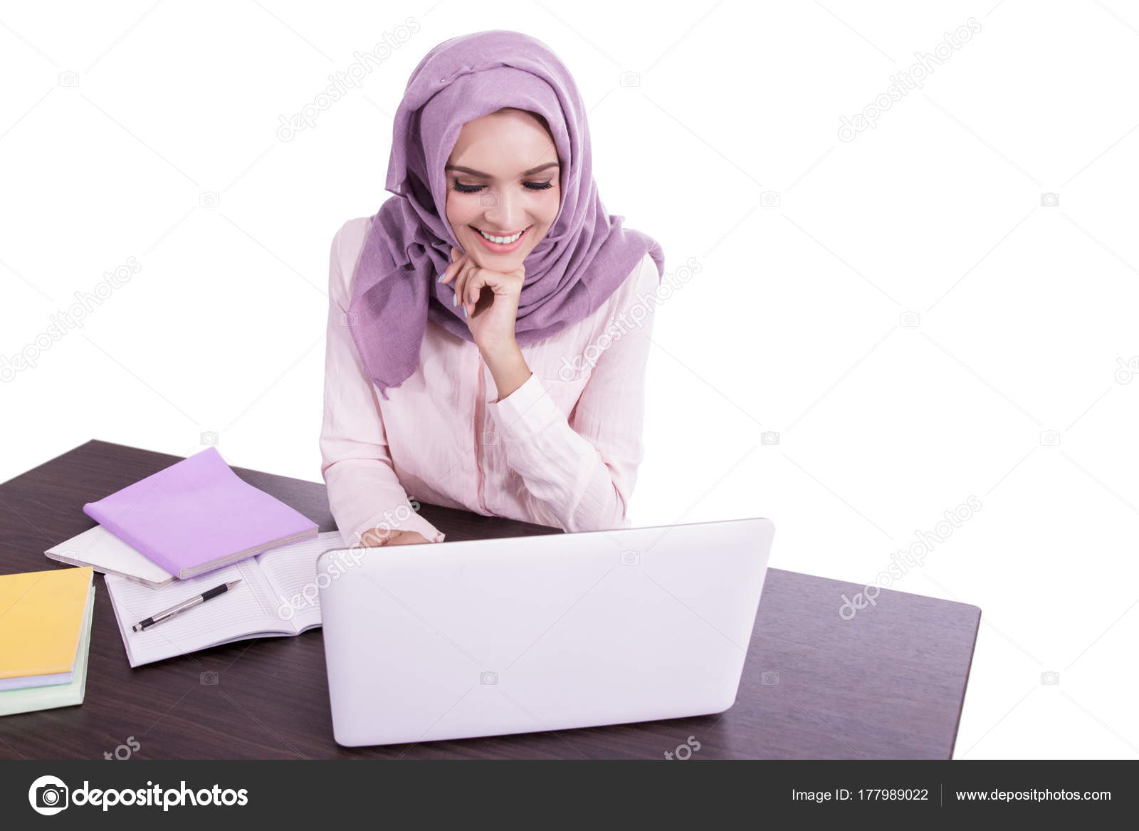 Beautiful college student wearing hijab studying on her laptop Stock ...